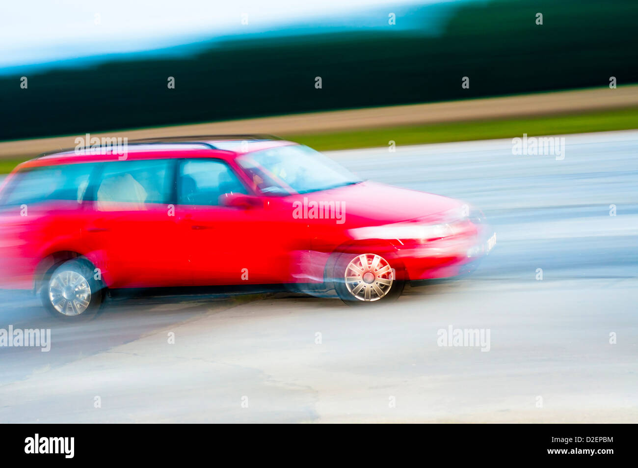 An abstract image of drunk driver driving red car Stock Photo - Alamy