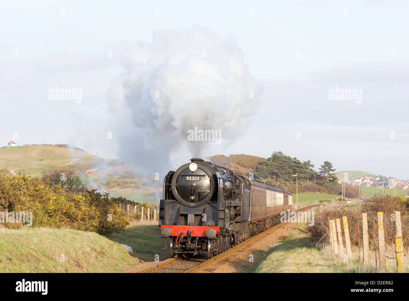 Steam train pulling passenger coaches hi-res stock photography and ...