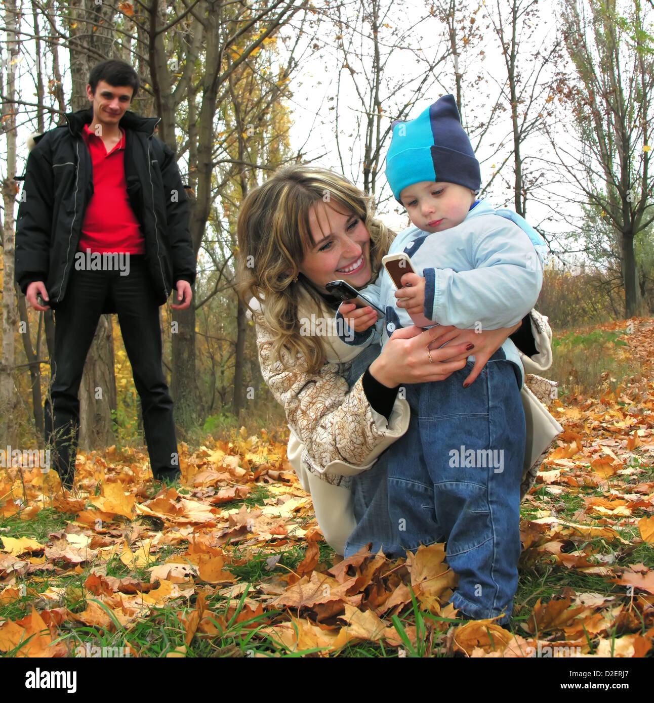 Happy young family Stock Photo - Alamy