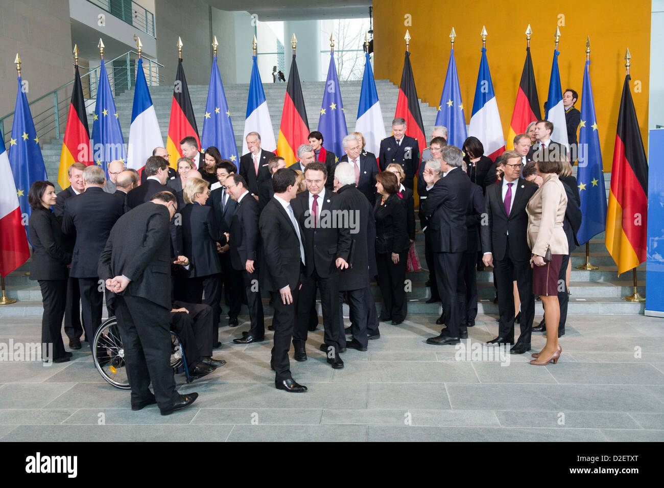 Members of the German and French government talk to each other after a ...