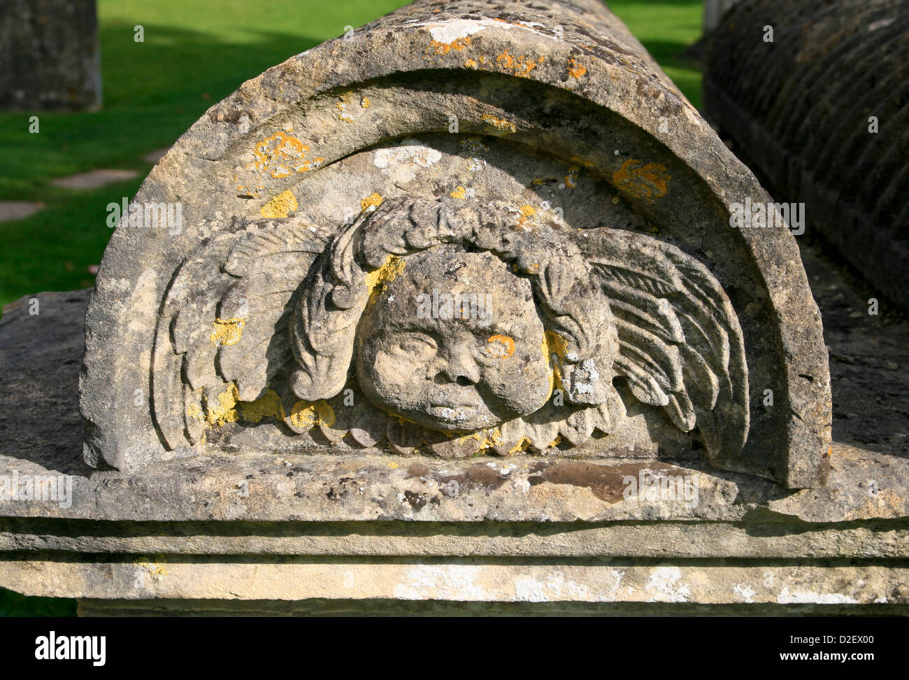 Cherub on woolsack tomb Bibury Gloucestershire England UK Stock Photo ...