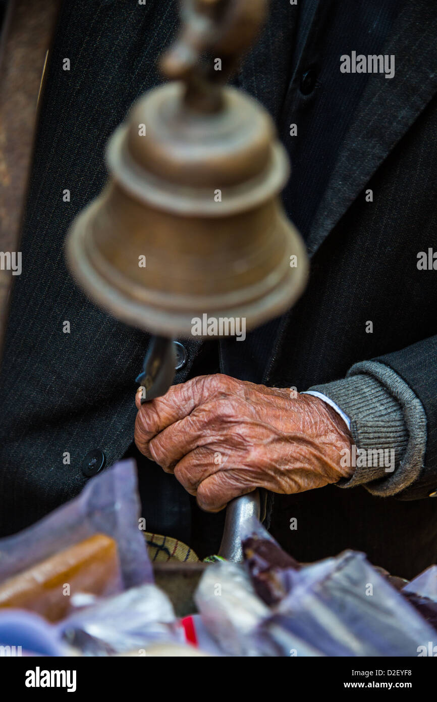 Elderly vendor ringing the bell on his bicycle to draw attention, Delhi ...