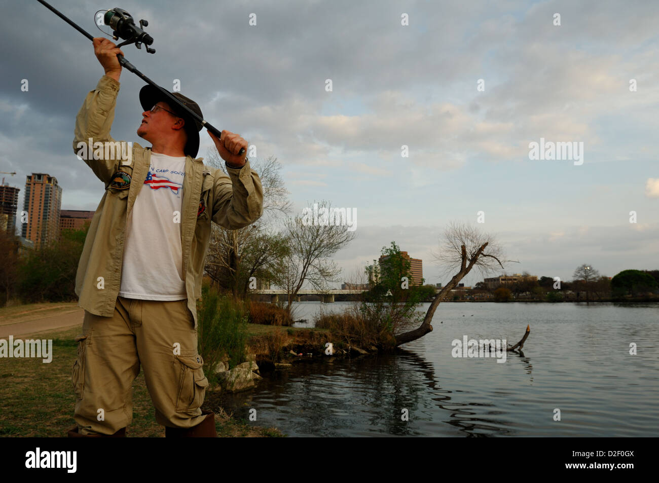 Man fishing for carp at Lady Bird Lake, Austin Texas Stock Photo - Alamy