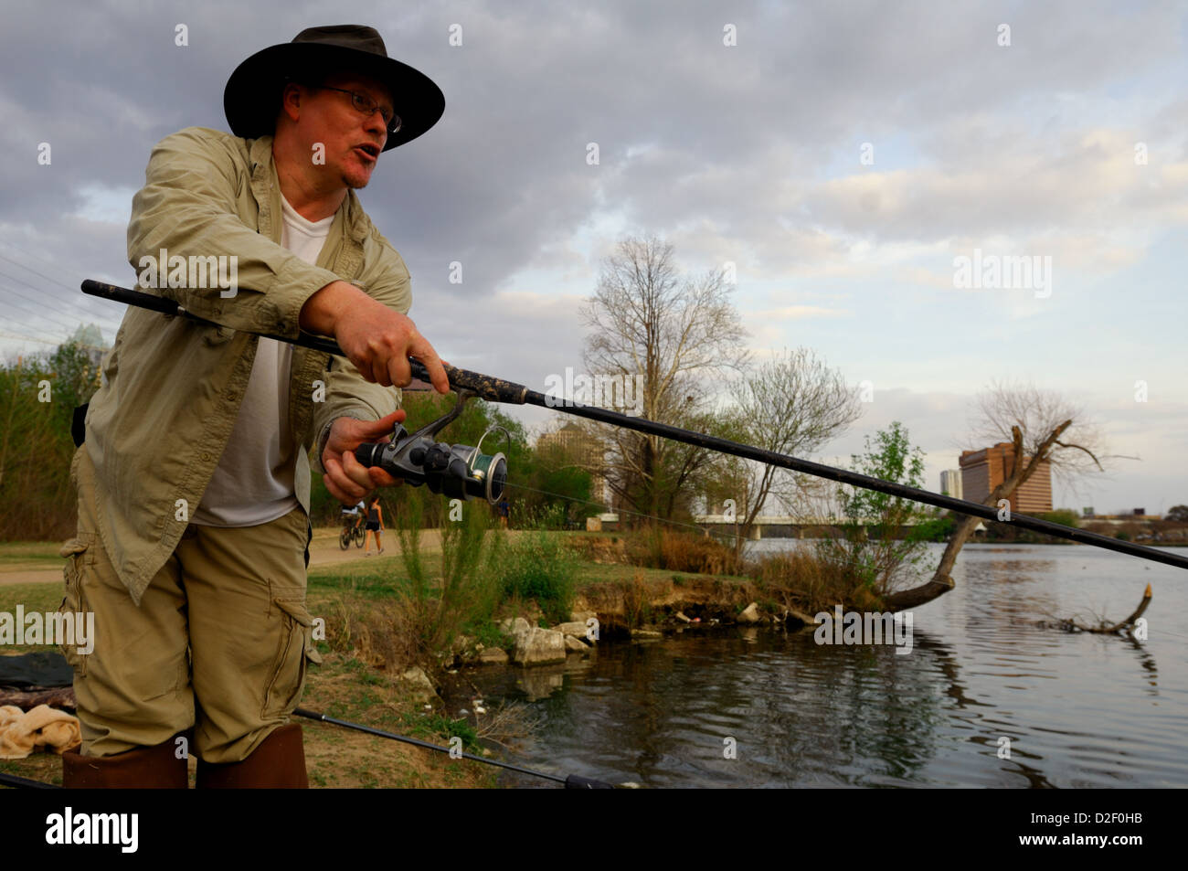 Man fishing for carp at Lady Bird Lake, Austin Texas Stock Photo - Alamy