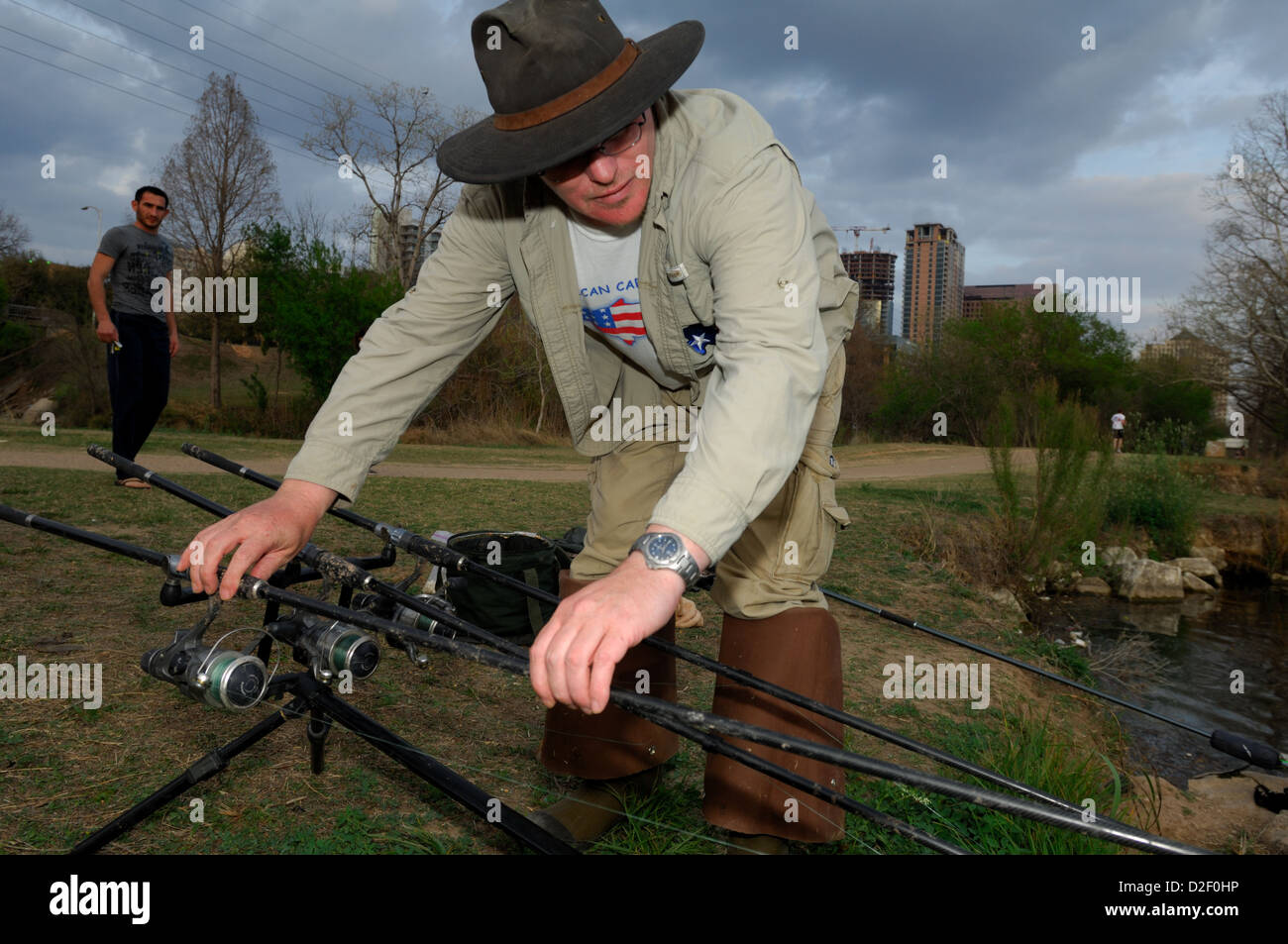 Man fishing for carp at Lady Bird Lake, Austin Texas Stock Photo - Alamy