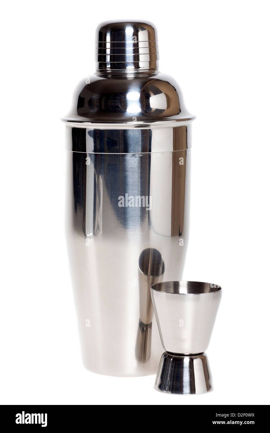 Glossy cocktail shaker with measuring cup front of white background ...