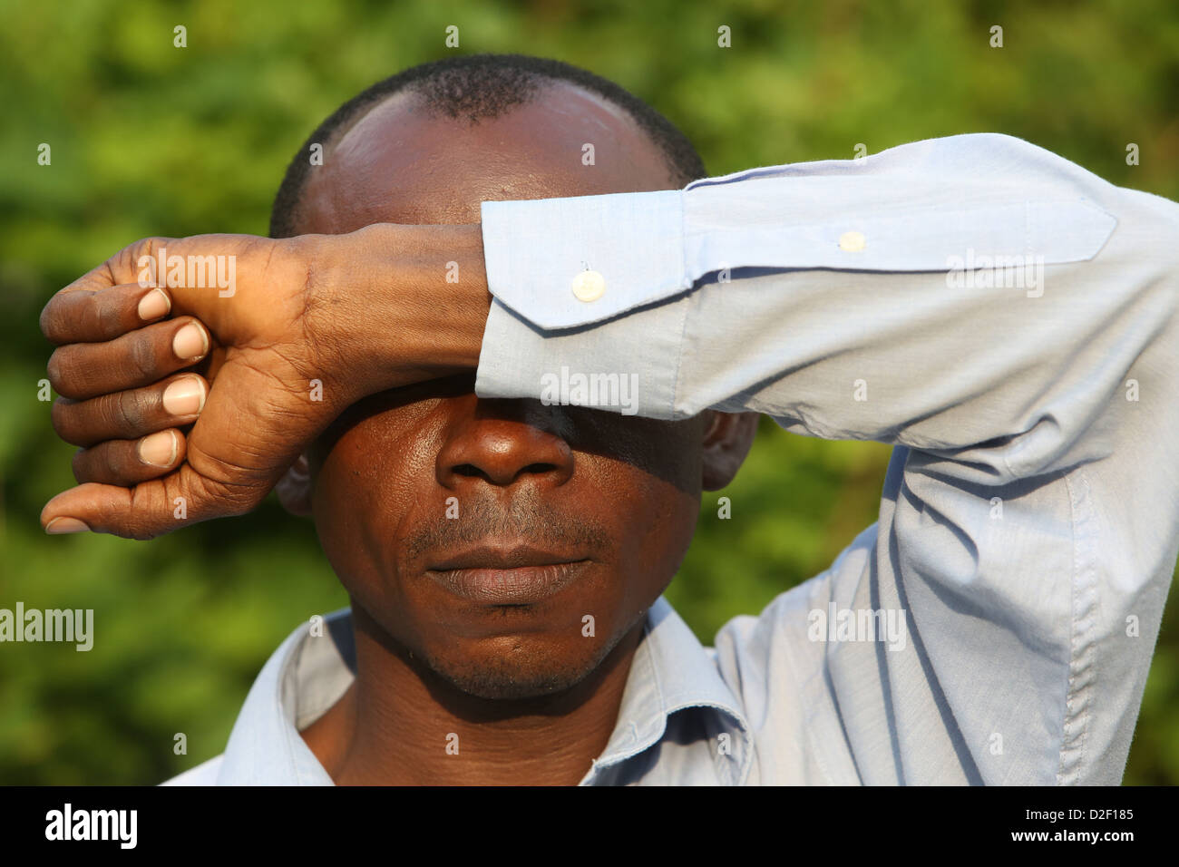 Man hiding his face France Stock Photo - Alamy