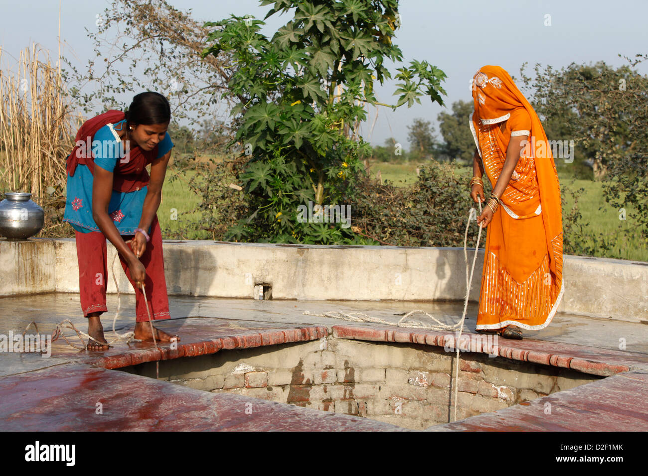 Women Fetching Water High Resolution Stock Photography and Images - Alamy