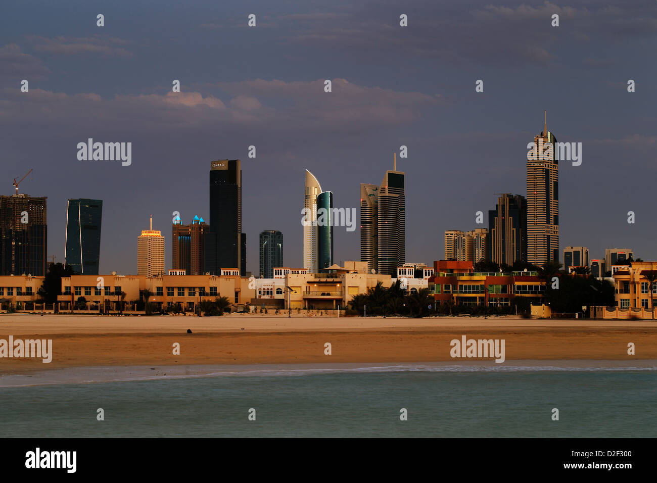 Dubai skyline at dusk seen from the Gulf Coast, shows the skyscrapers ...