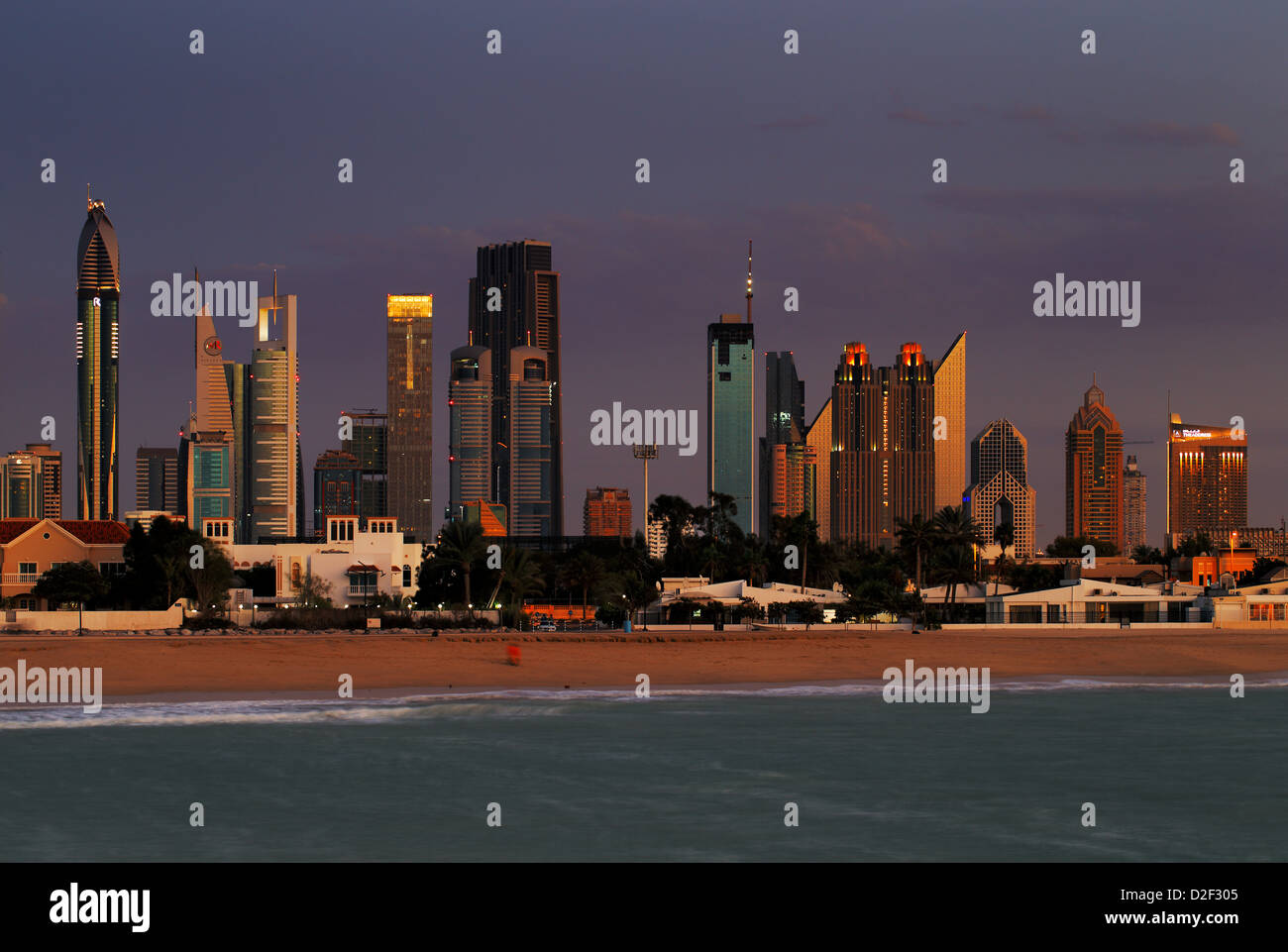 Dubai skyline at dusk seen from the Gulf Coast, shows the skyscrapers ...