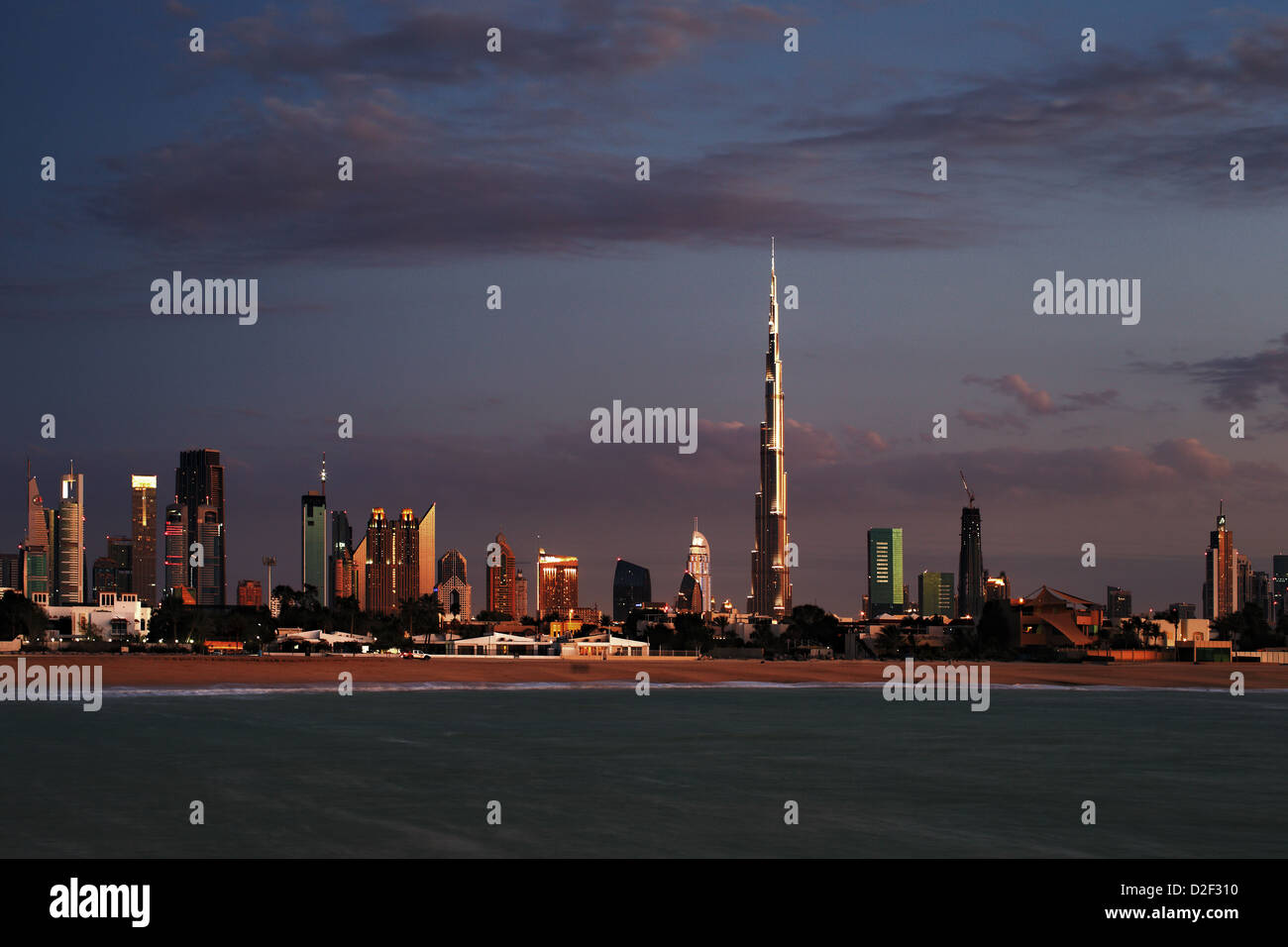 Dubai skyline at dusk seen from the Gulf Coast, shows the skyscrapers ...