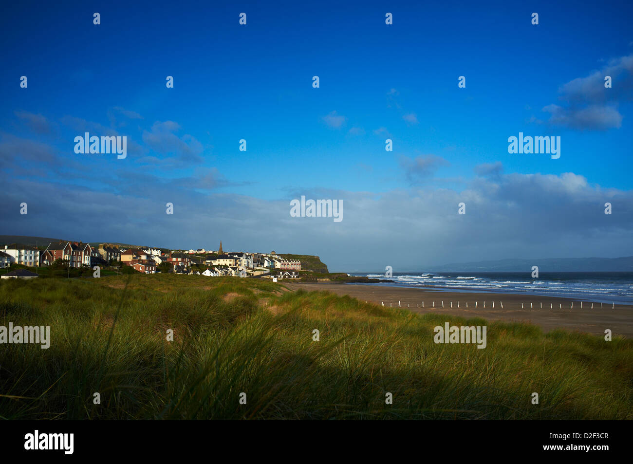 The town of Castlerock with grass and beach in foreground County ...