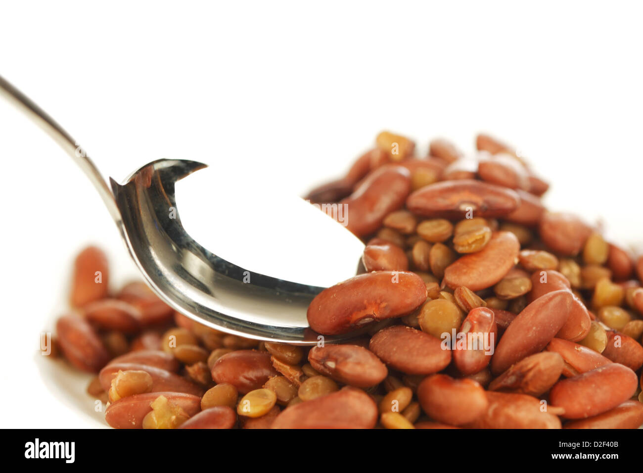 Cooked red beans and lentils on spoon close-up Stock Photo - Alamy