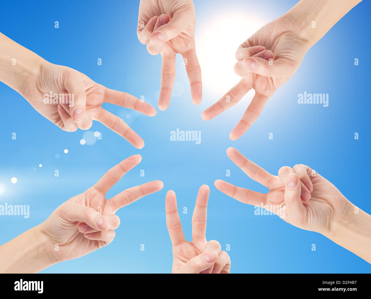 Hands of teamwork , forming the star shape Stock Photo - Alamy