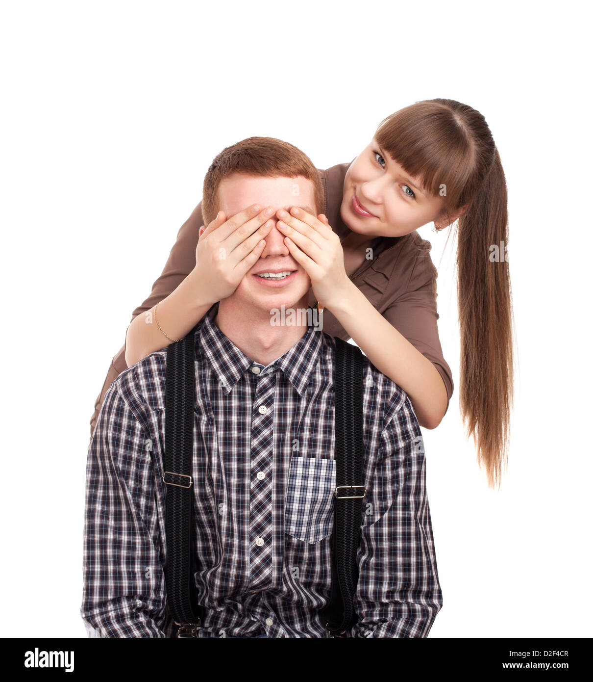 Woman covering mans eyes Stock Photo - Alamy