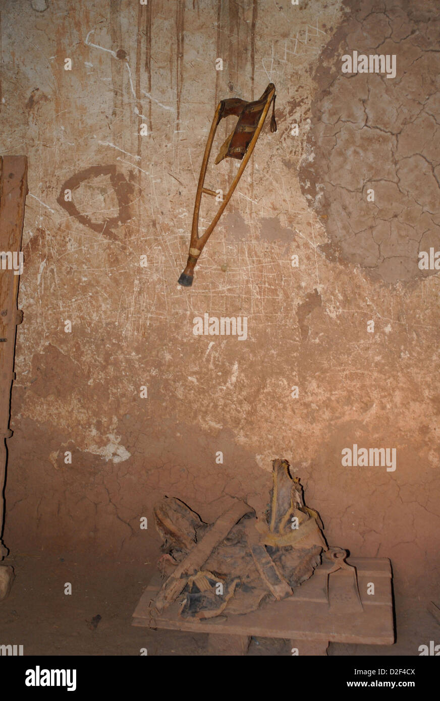 artificial leg hanging on the wall at ait ben haddou Stock Photo - Alamy