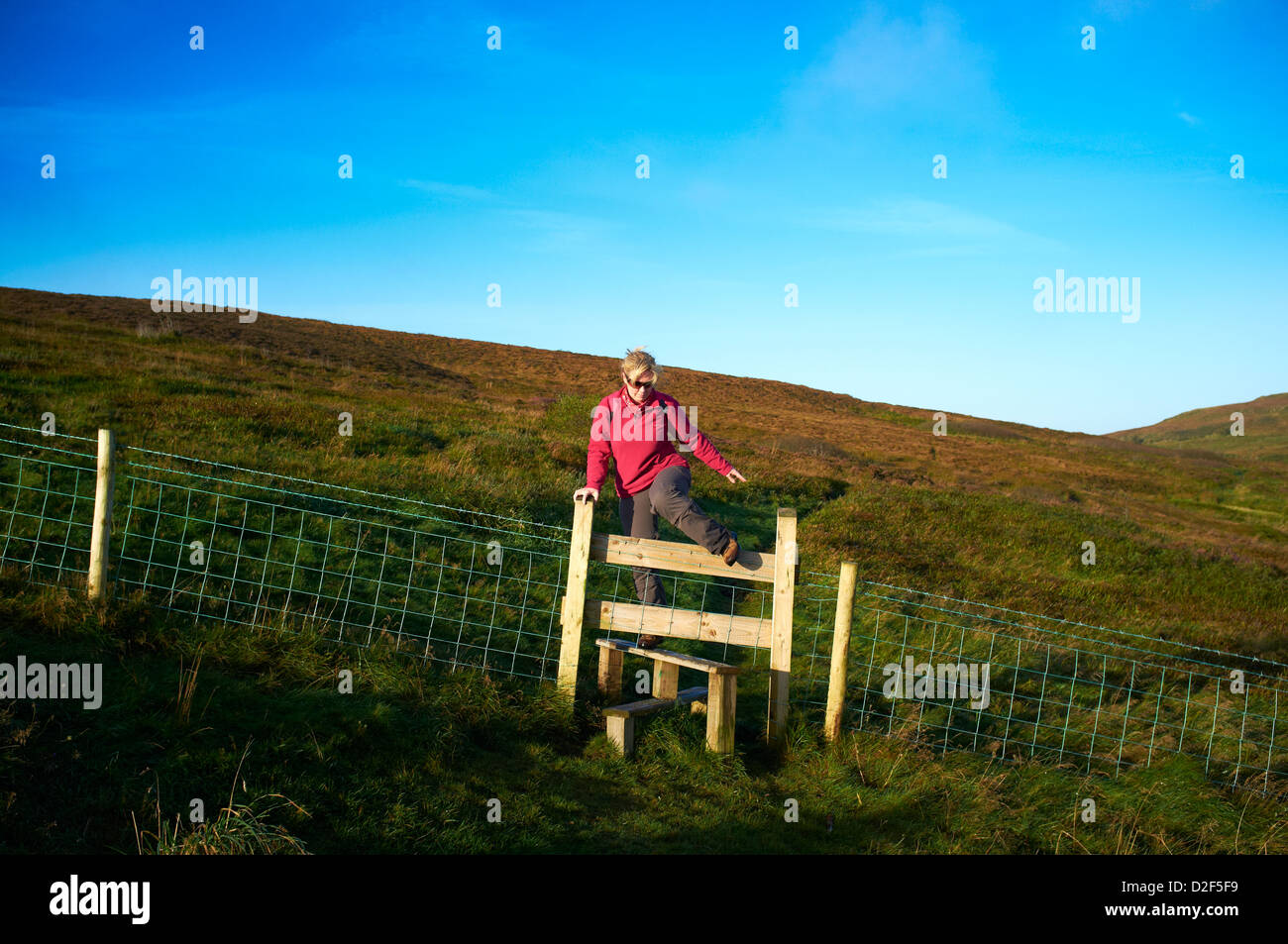 Woman walker on hill hi-res stock photography and images - Alamy