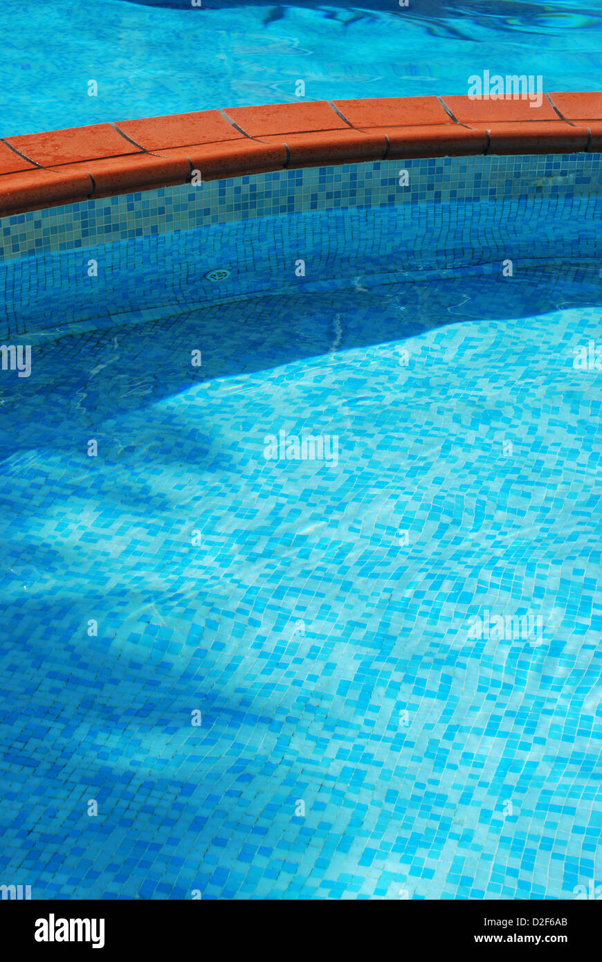 Clean water in a beautiful turquoise swimming pool detail Stock Photo ...
