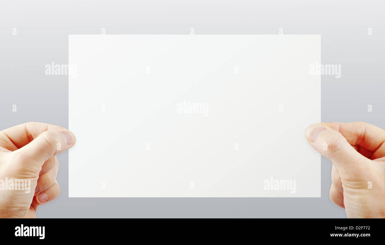 Hands holding paper Stock Photo - Alamy