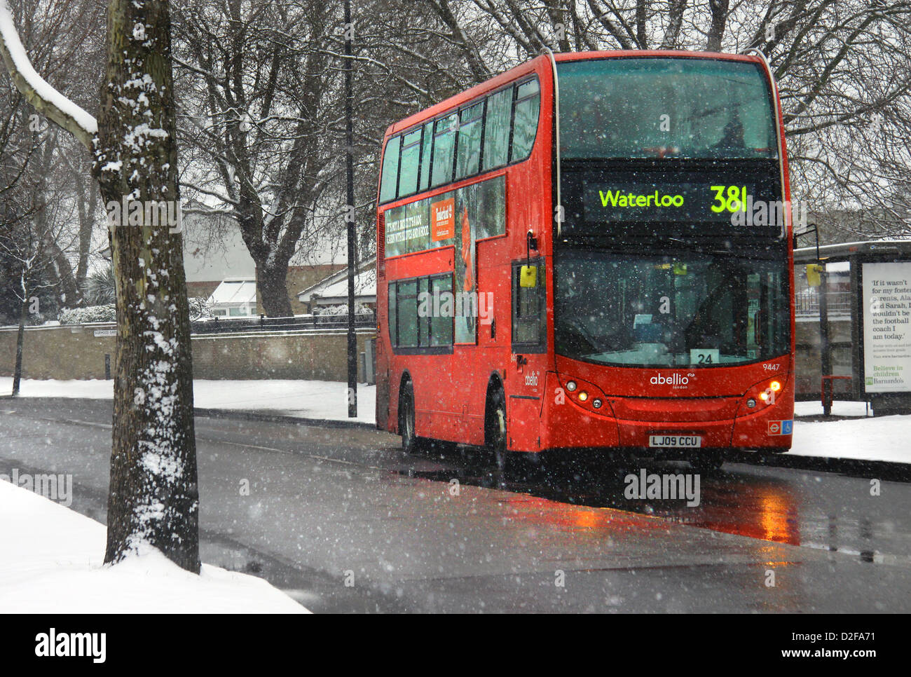 Red bus snow hi-res stock photography and images - Alamy