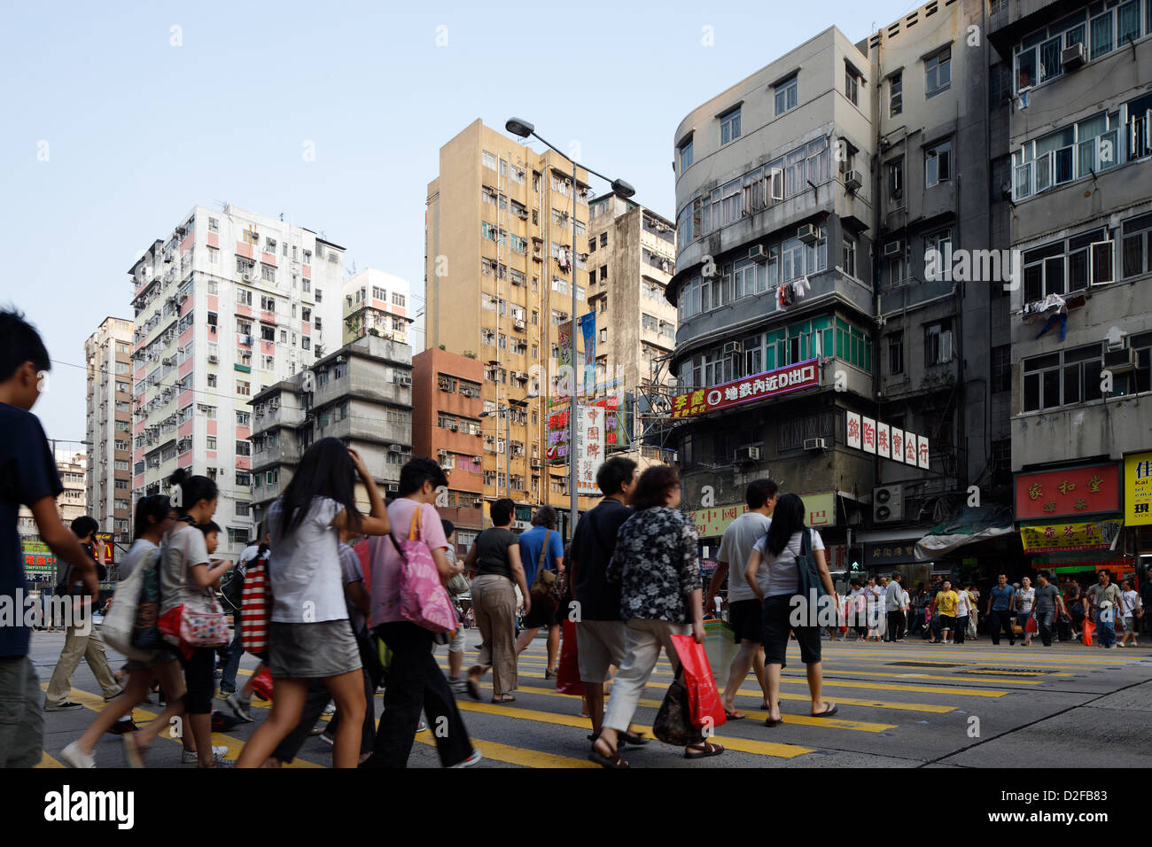 Hong Kong, China, pedestrians to cross a crosswalk in Sham Shui Po ...