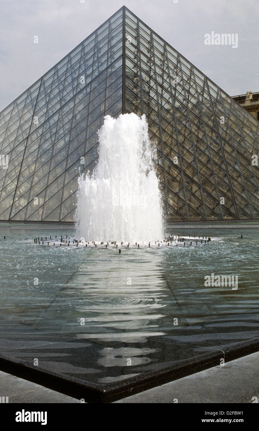 Color photograph of the Pyramid Fountain at the Louvre Museum, Paris ...