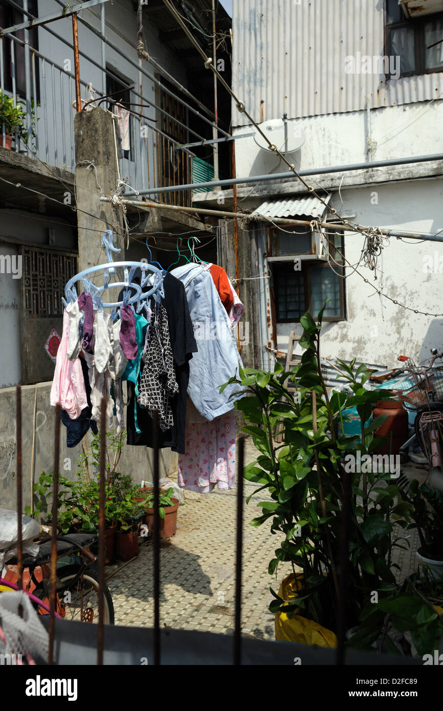 Hong Kong, China, laundry hangs out to dry Stock Photo - Alamy