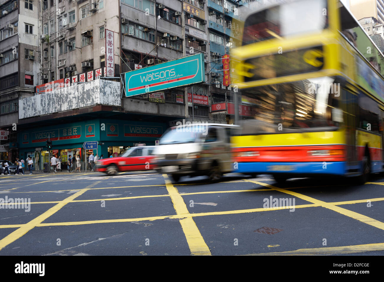Hong Kong, China, cars will cross an intersection in Hong Kong Wan Chai ...