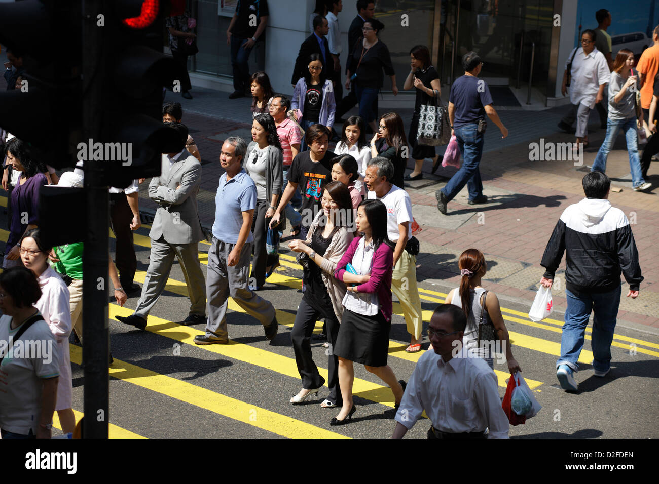 Hong Kong, China, pedestrians to cross a zebra crossing in Hong Kong ...