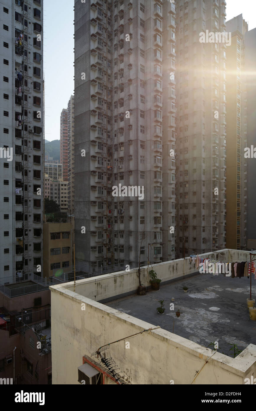 Hong Kong, China, the sun is reflected in a window in a residential ...