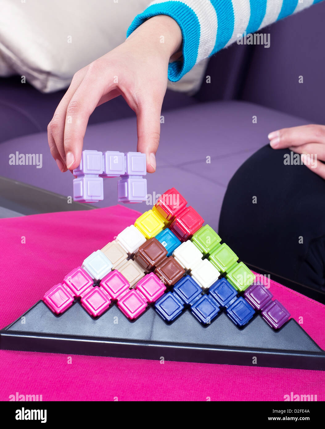 Playing with blocks games, building blocks of the pyramid Stock Photo ...