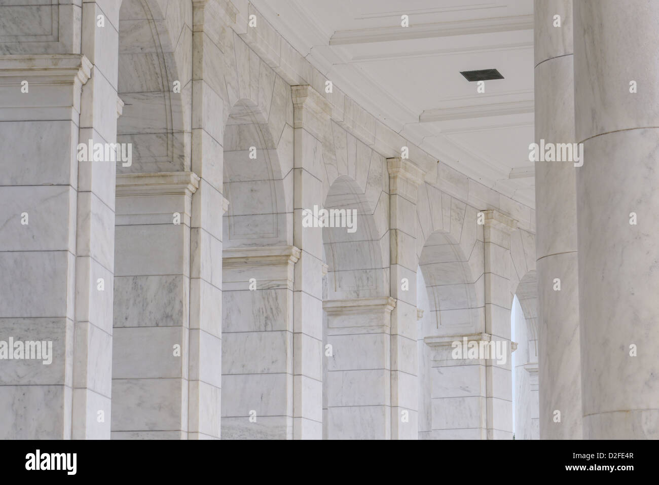 Stone Pillars with white Arches Stock Photo - Alamy