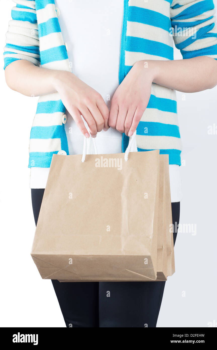 Shopping woman carrying brown paper bags Stock Photo - Alamy