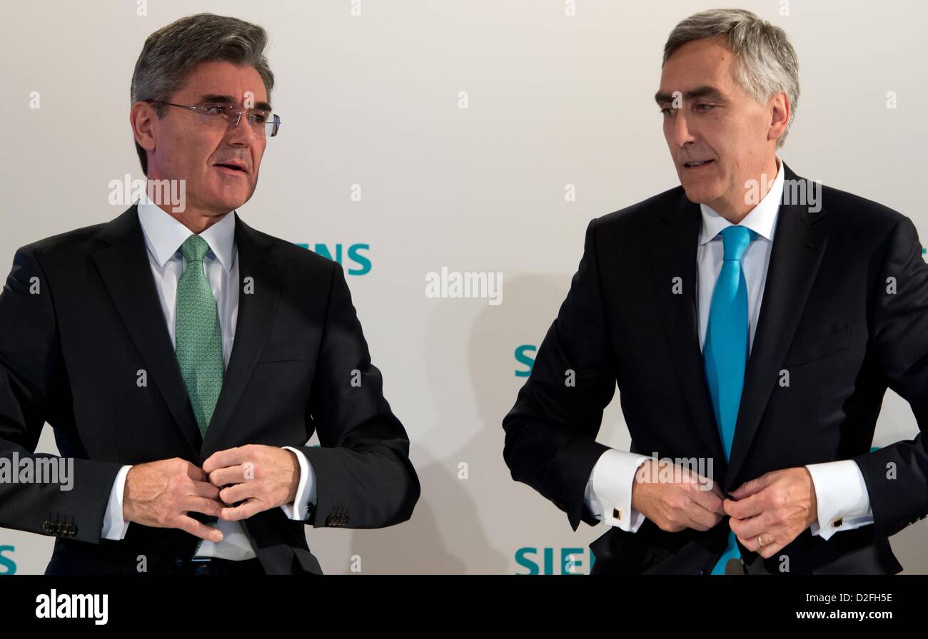 CFO of Seimens Joe Kaeser (L) and CEO of Siemens Peter Loescher stand ...