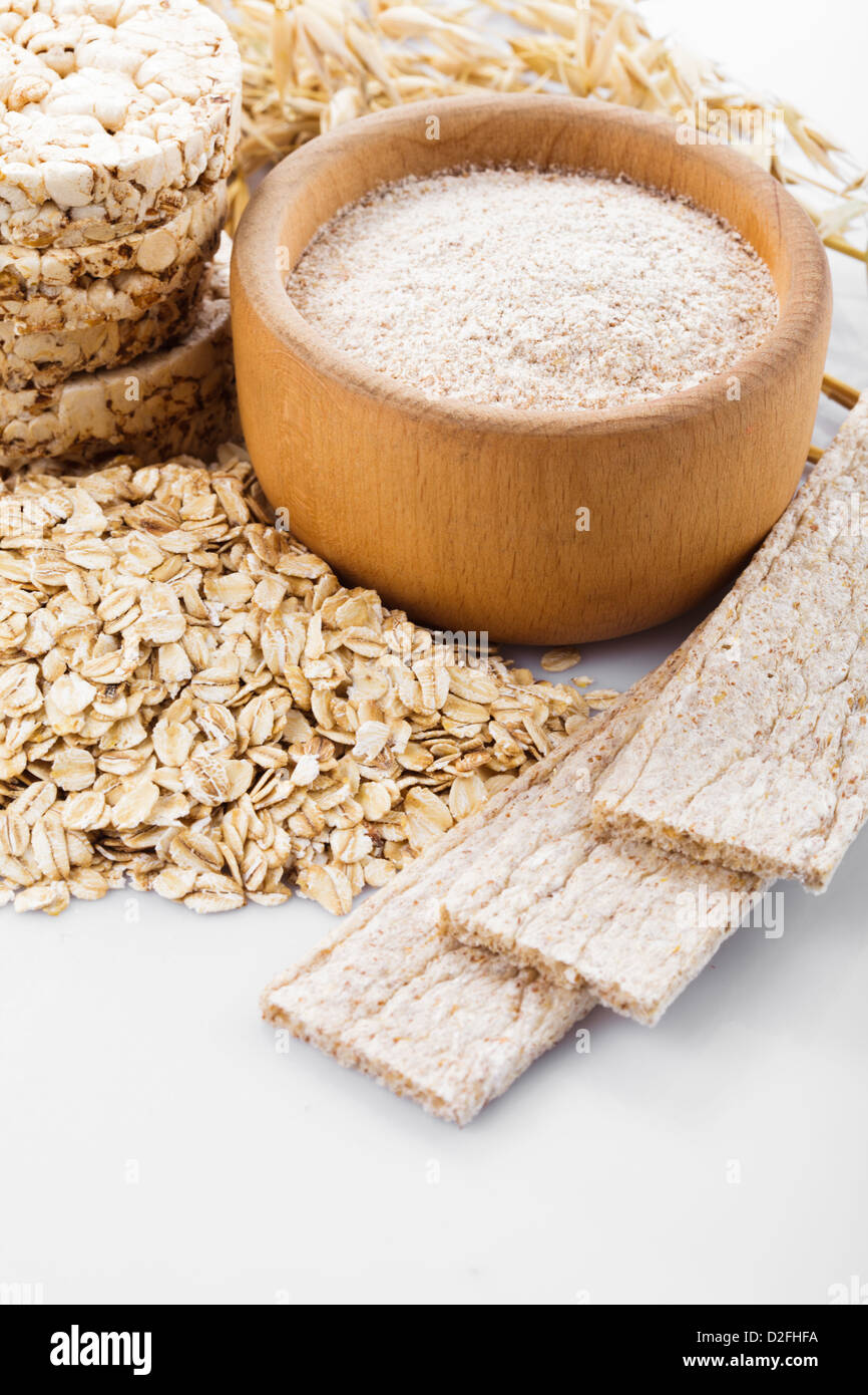 Various dietary oat products on white background Stock Photo - Alamy