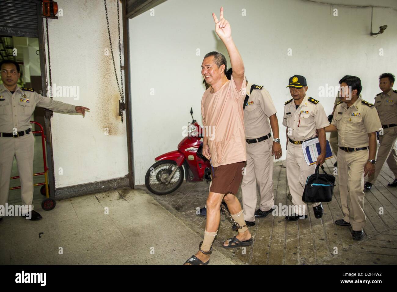 Jan. 23, 2013 - Bangkok, Thailand - SOMYOT PRUESAKASEMUK waves the ''V ...