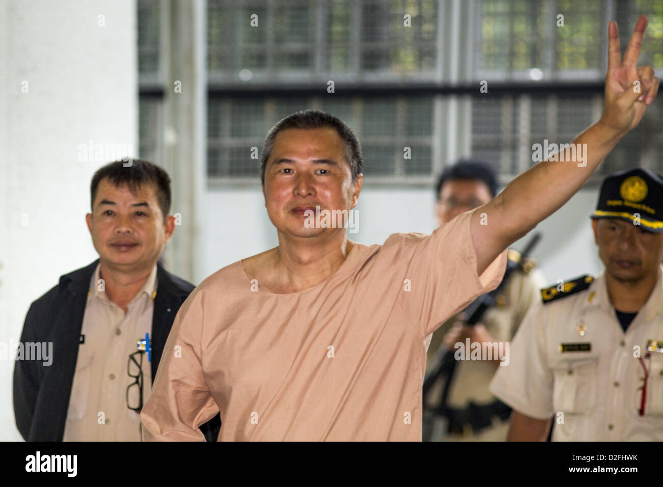 Jan. 23, 2013 - Bangkok, Thailand - SOMYOT PRUESAKASEMUK waves the ''V ...