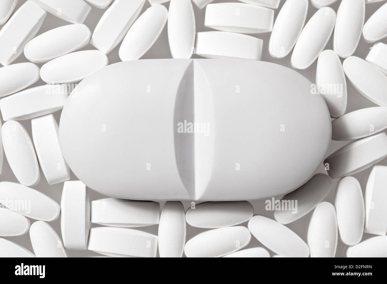 Pills - Generic white lozenge shaped blank pills on a white background ...