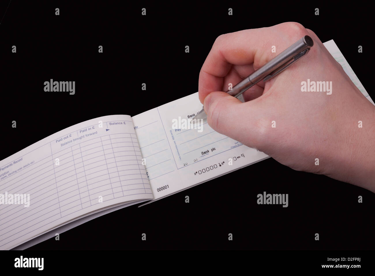 Check book and pen Stock Photo - Alamy