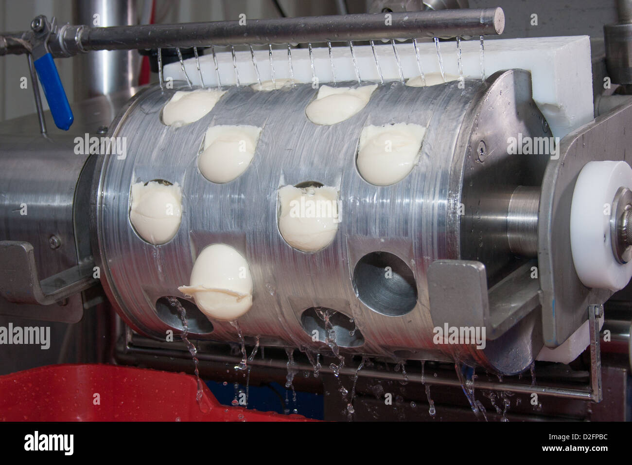 Production line machinery processing freshly fermented cheese Stock ...