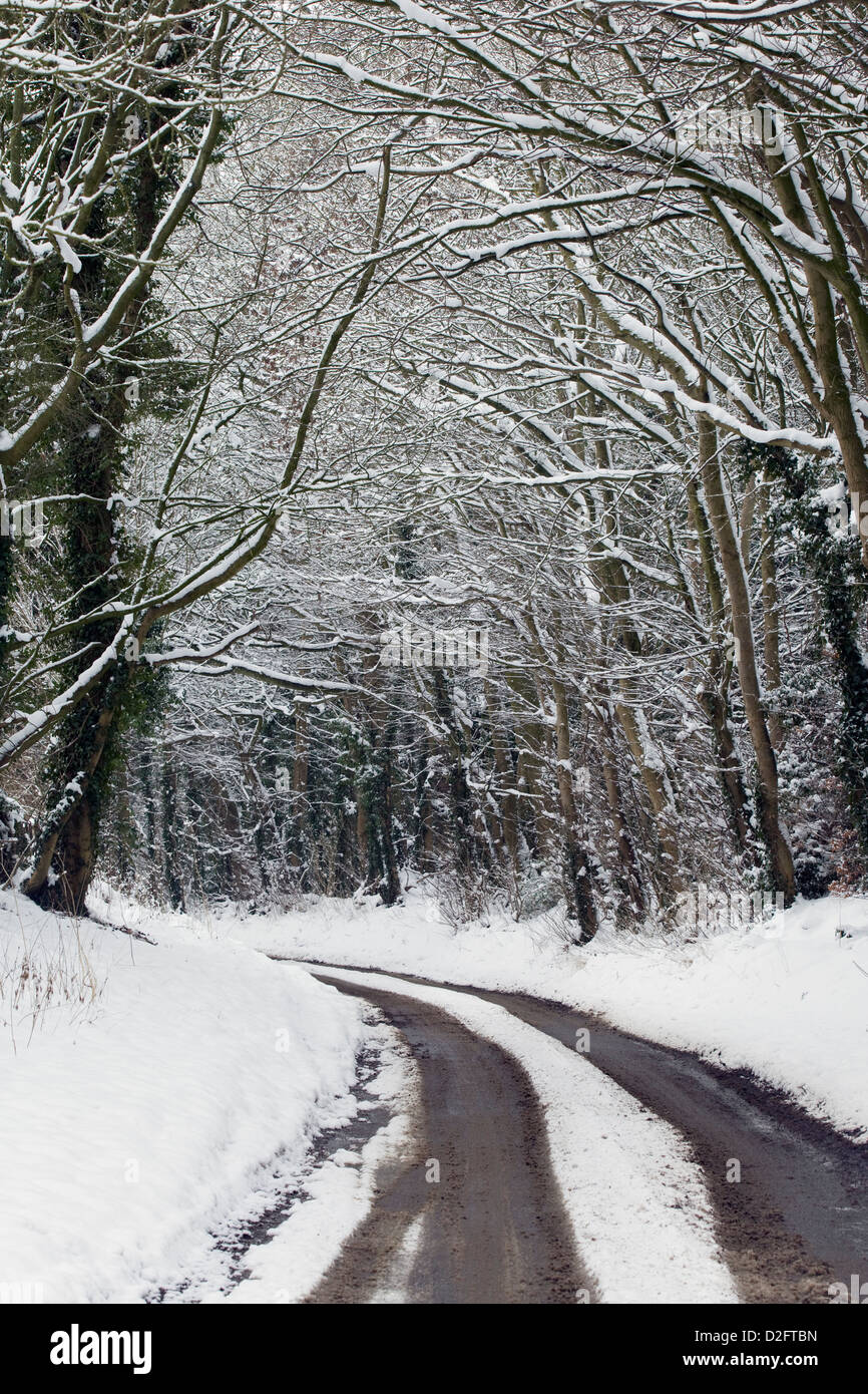 snow covered Country road Stock Photo - Alamy