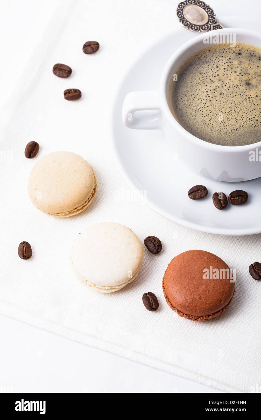 Three colors of macaroons in brown and beige tones Stock Photo - Alamy