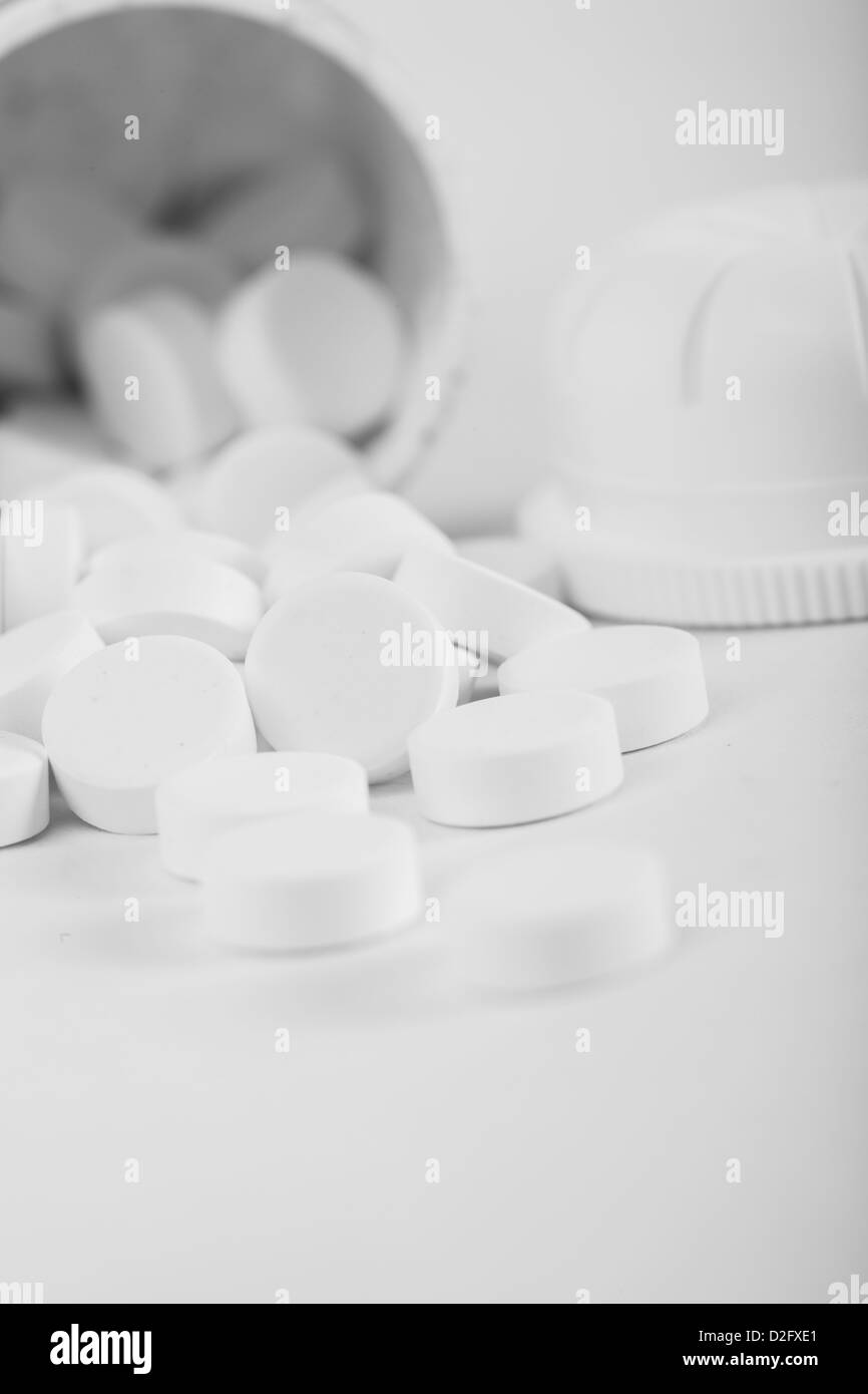 Pills in container tablets Black and White Stock Photos & Images - Alamy