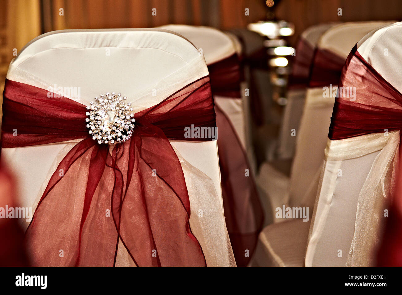 Decorated chairs at a wedding Stock Photo - Alamy