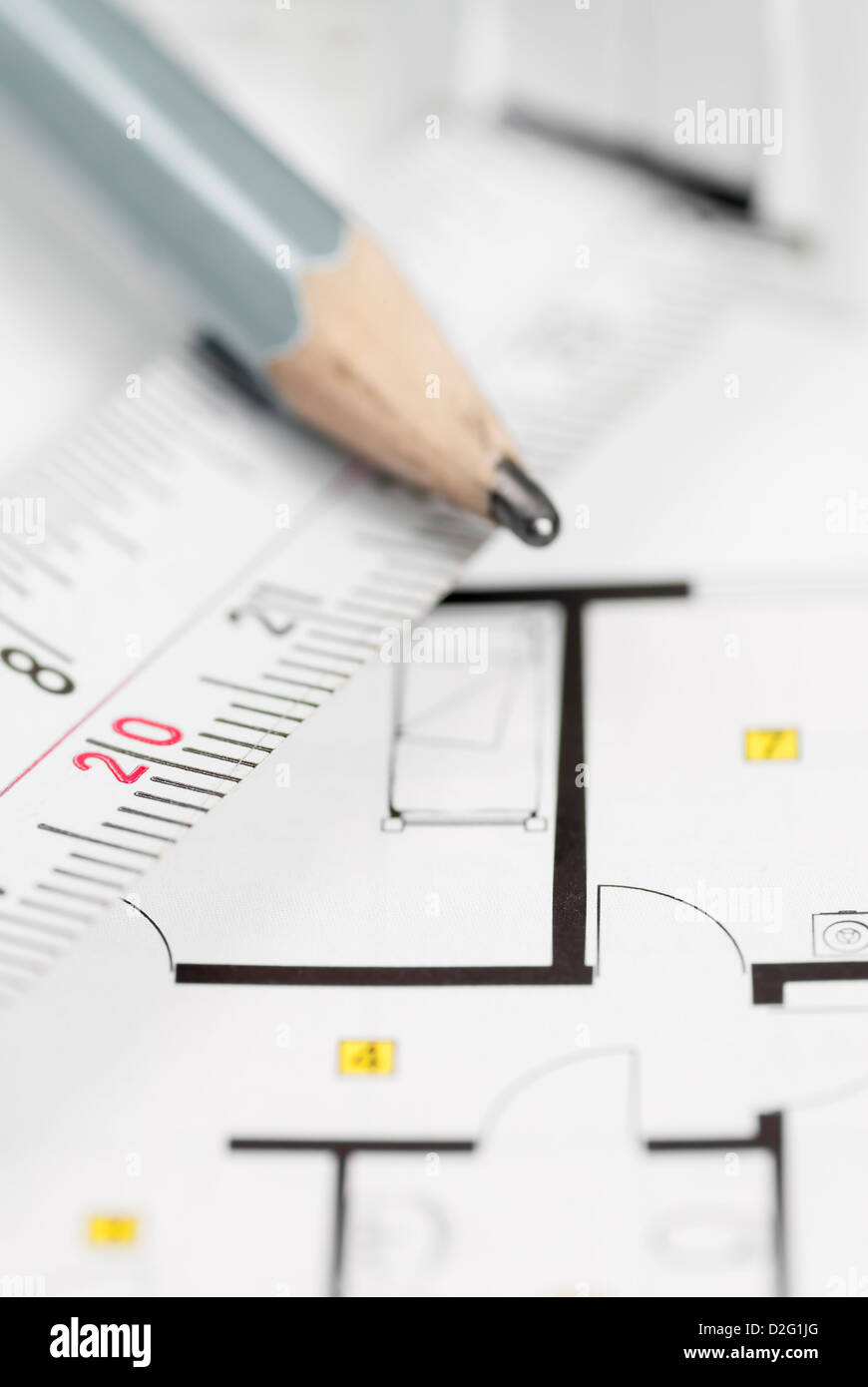 White tape measure on architect plans with pencil Stock Photo - Alamy