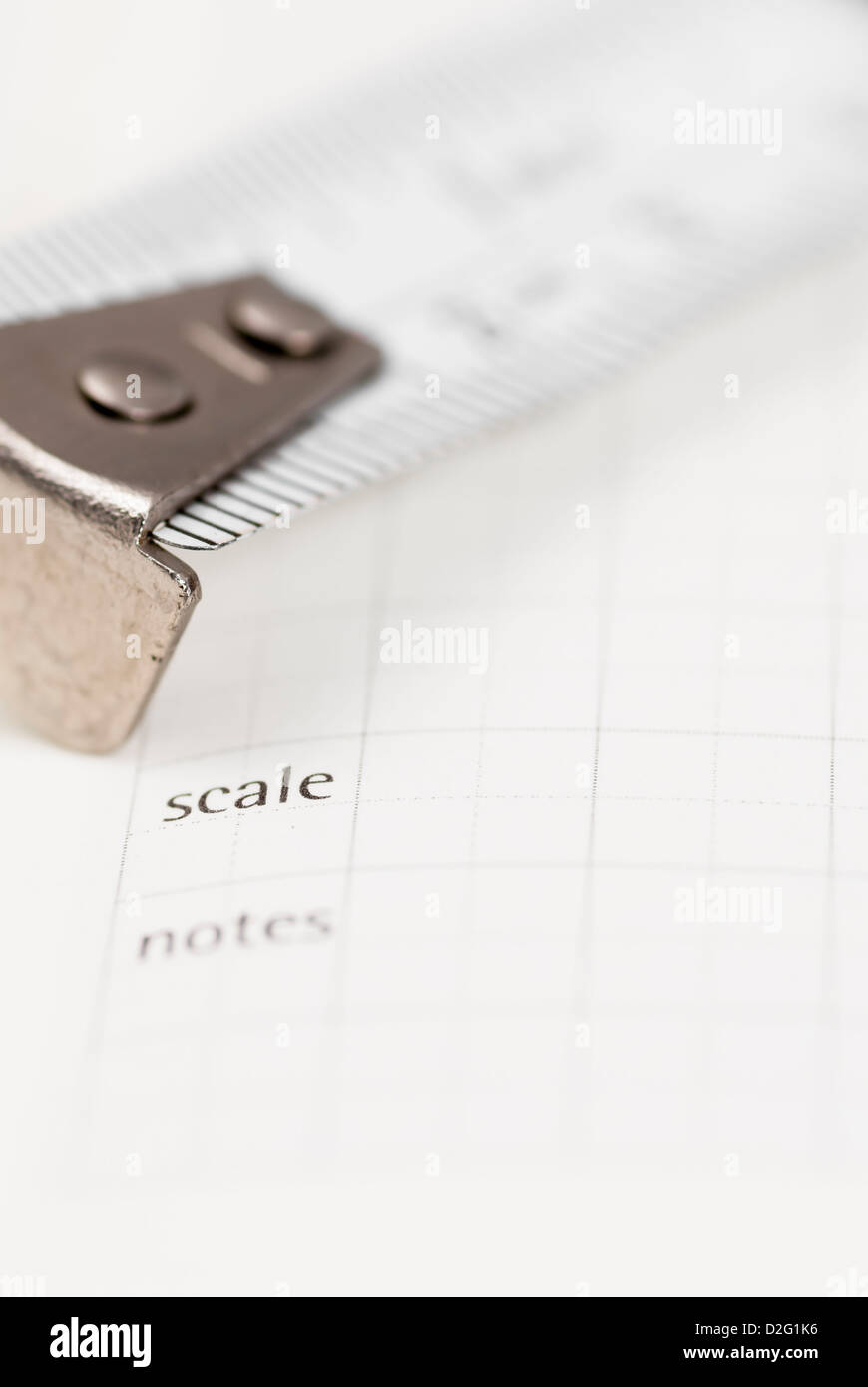 White tape measure on graph paper Stock Photo - Alamy