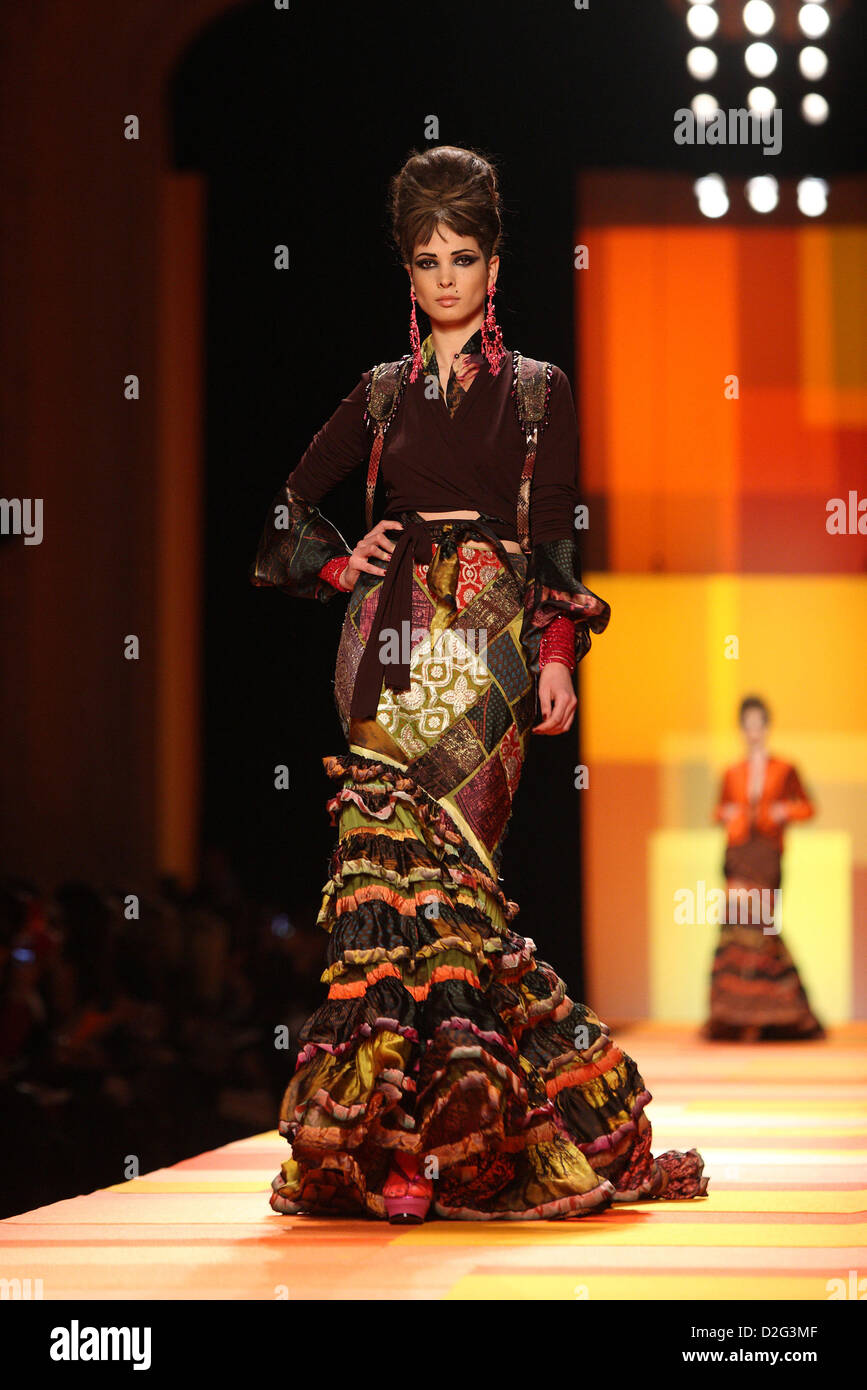 A model wears a creation by French designer Gaultier as part of his ...