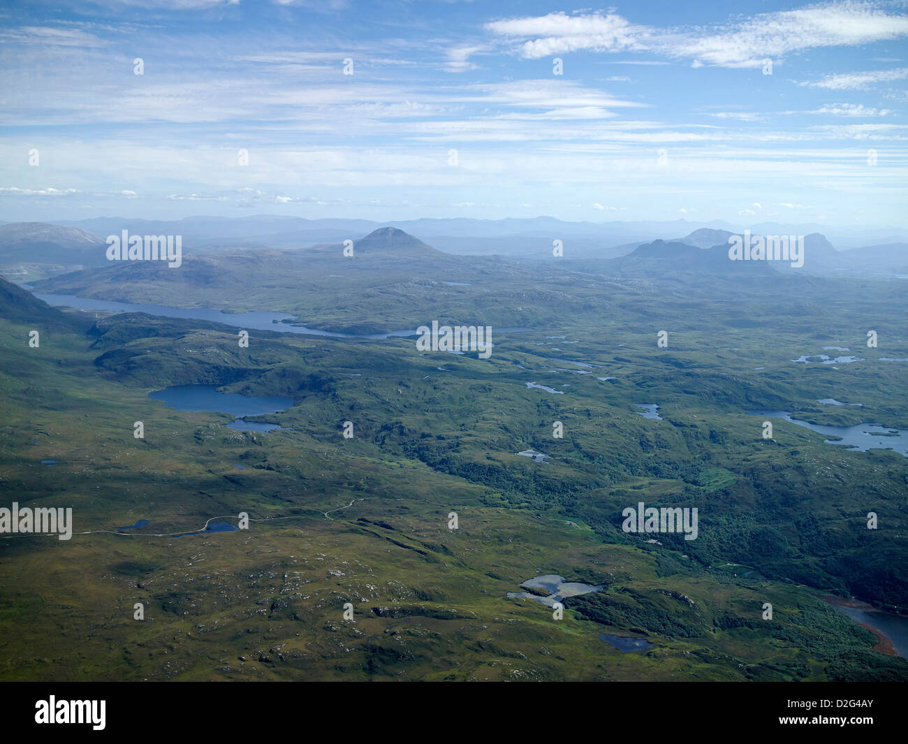 A panoramic view over the wilds of Sutherland, Loch Assynt, Canisp and ...