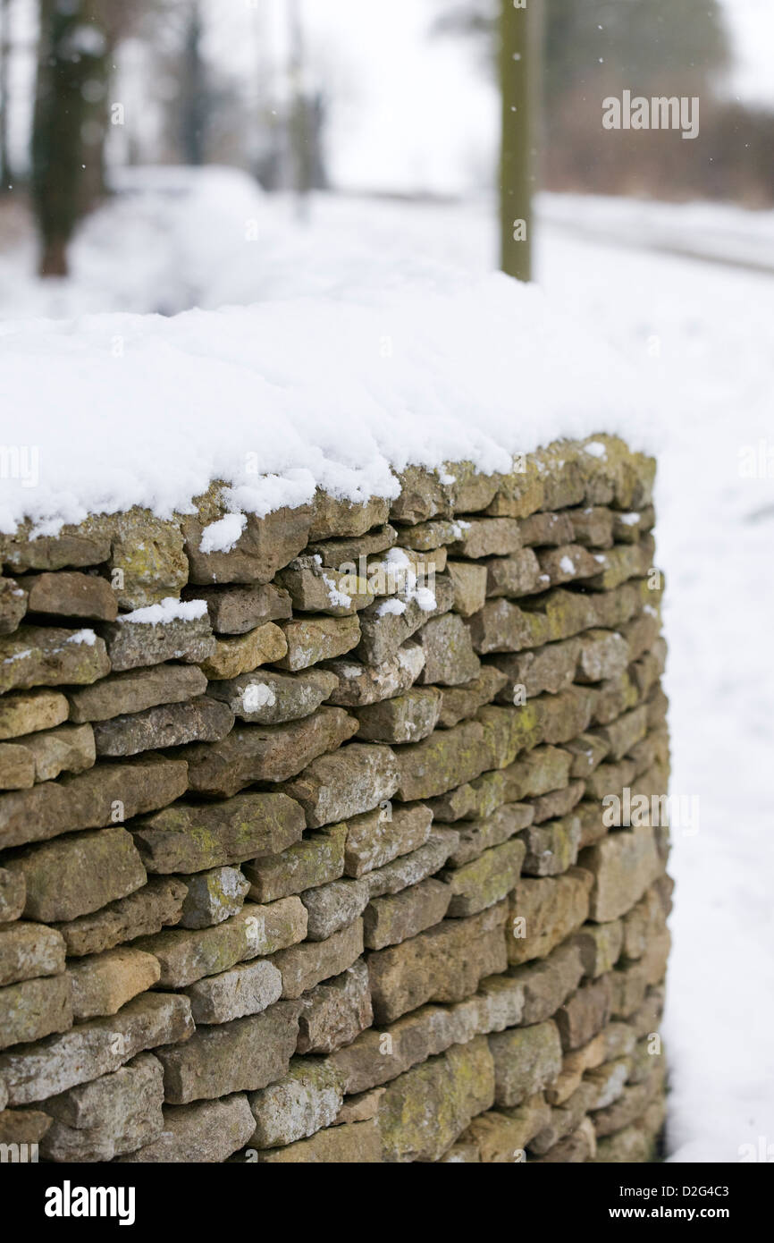 Stone wall covered in Snow in the English countryside Stock Photo - Alamy