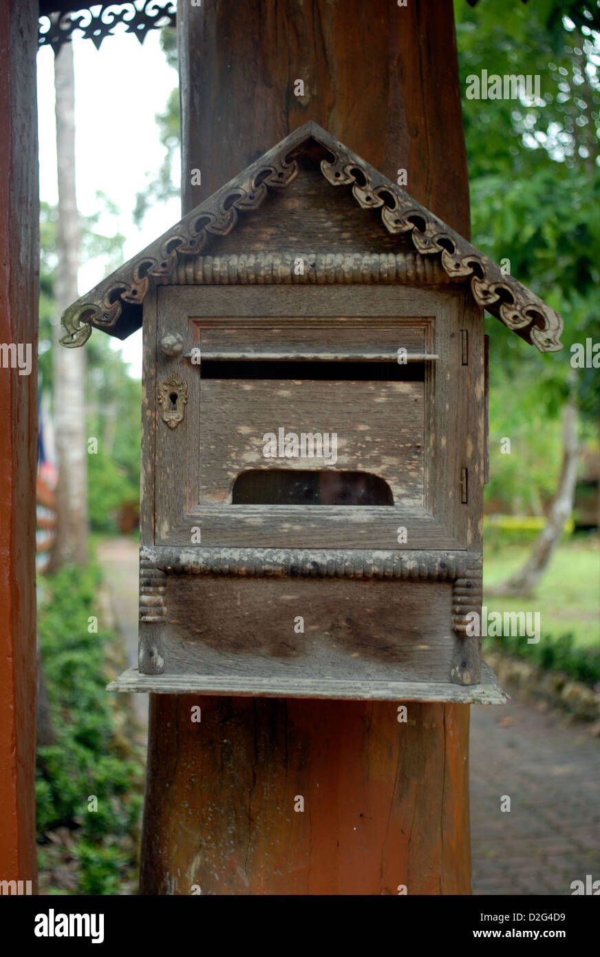 old weathered mail bow on a tree in Koh chang thailand Stock Photo - Alamy